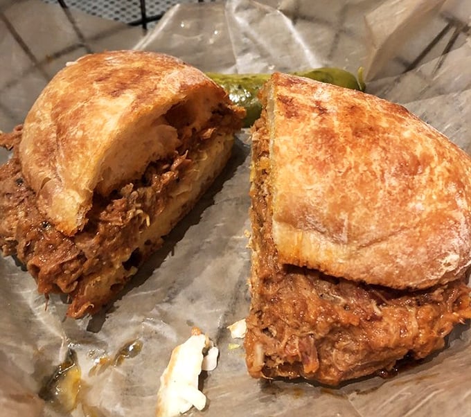 Pulled pork that doesn't just fall apart – it surrenders completely to your taste buds, bringing sweet, tangy, and savory notes to every bite.