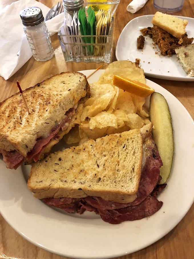 The Reuben – where corned beef, sauerkraut and Russian dressing hold their delicious summit between grilled rye bread borders.