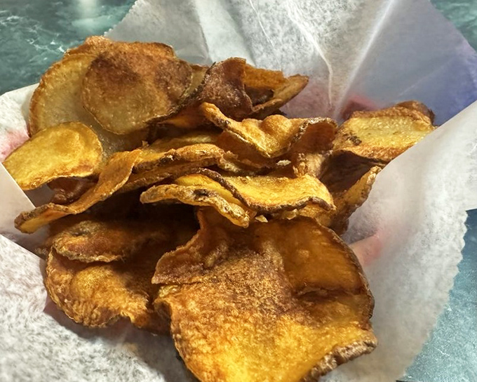 Homemade potato chips that shatter with each bite—the kind that make you wonder why you ever settled for the bagged version.