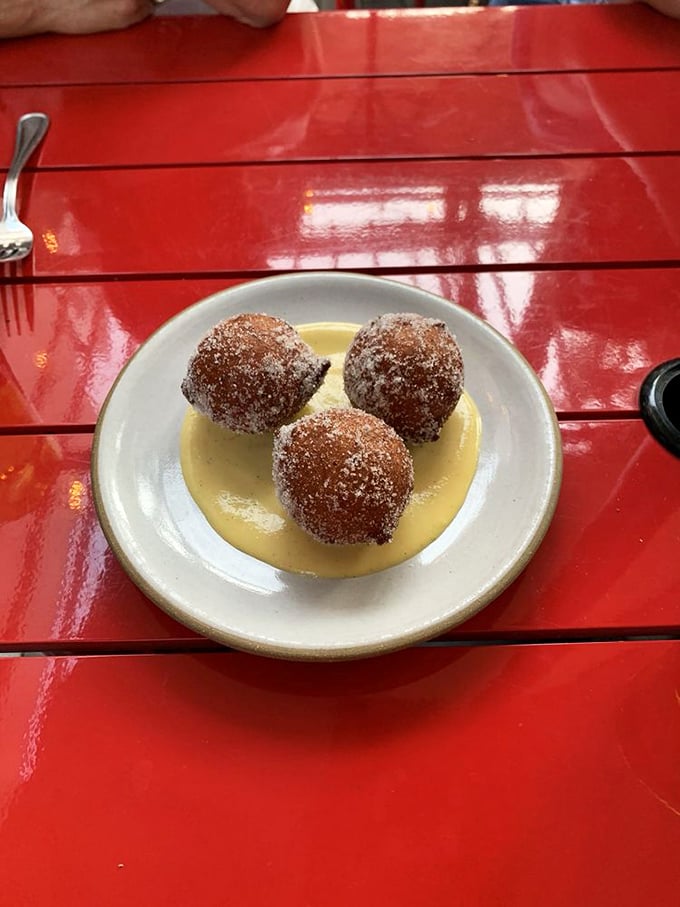 These sugar-dusted ricotta fritters aren't just dessert; they're warm, pillowy clouds of sweetness that make you forget all your troubles.