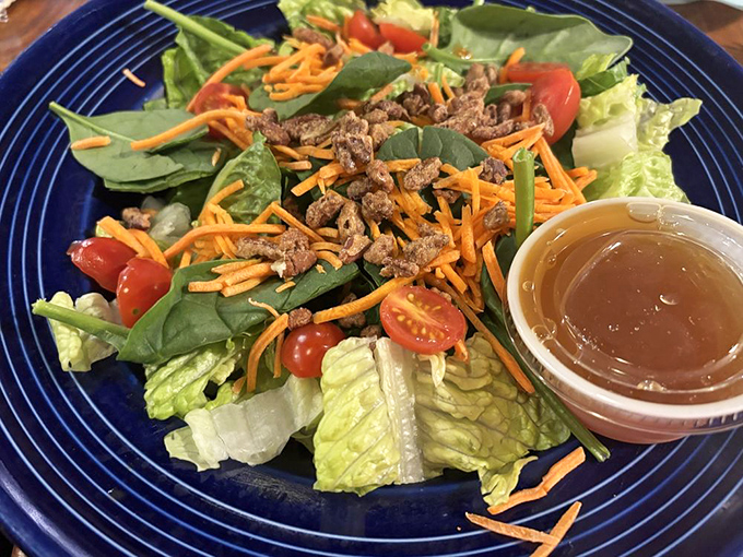 "A garden salad that doesn't apologize for being simple – fresh ingredients letting you reset your palate between seafood indulgences."