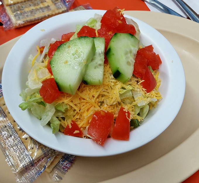 A garden salad that doesn't apologize for being healthy—it's too busy showing off those fresh vegetables and that perfect sprinkle of cheese.