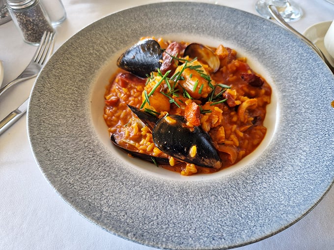 A seafood risotto that makes you wonder if mermaids might swim up just to place a takeout order.