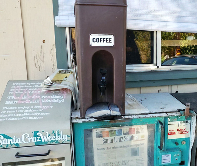 The newspaper stand and self-serve coffee station outside—a time portal to when "morning ritual" meant more than checking your phone.