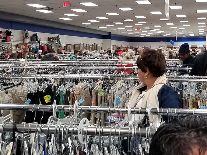 The thrill of the hunt brings shoppers from all walks of life. That focused expression is universal – it's the look of someone who just spotted potential treasure.