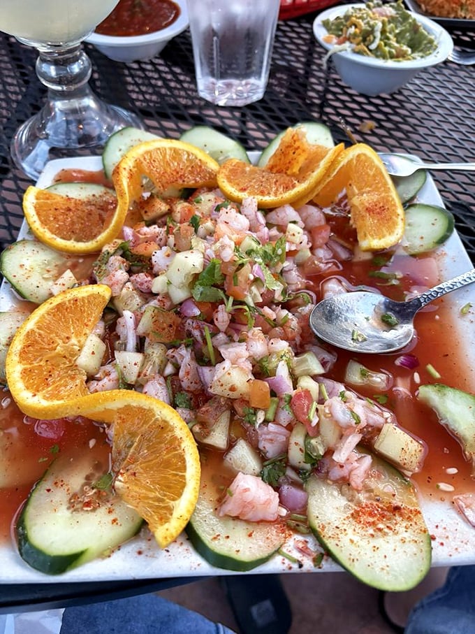 This isn't just ceviche—it's a refreshing flavor fiesta with cucumber, orange, and enough lime to make your mouth do a happy dance.