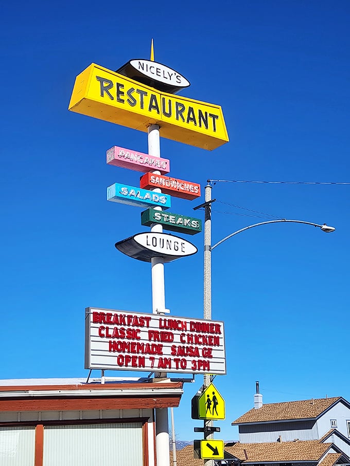 That retro sign isn't just advertising—it's a landmark, a promise, and for many Eastern Sierra travelers, the most welcome sight after hours on Highway 395.