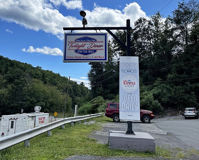 The roadside sign stands like a lighthouse for hungry travelers—"Home-Made Food" isn't just a slogan, it's a solemn vow.