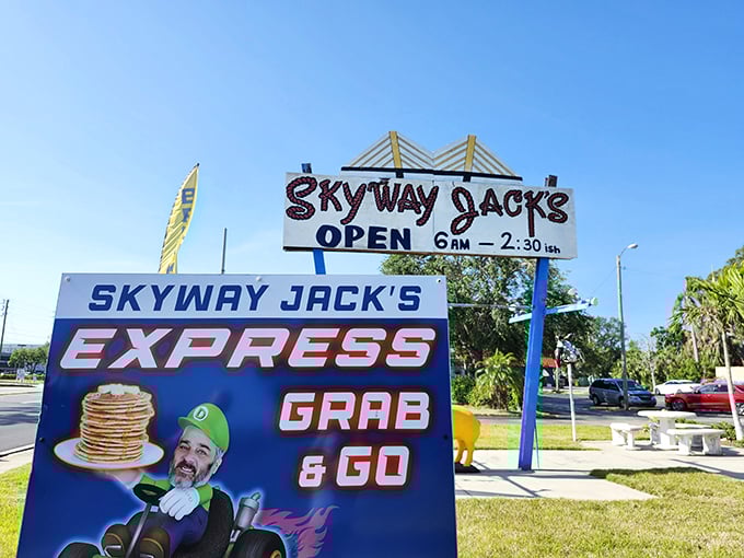 The roadside sign announces "GRAB & GO" with cartoon flair, but trust me—you'll want to linger over whatever breakfast treasures you find inside.