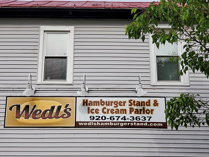 The sign says it all—Wedl's Hamburger Stand & Ice Cream Parlor, where two of life's greatest pleasures unite under one roof.