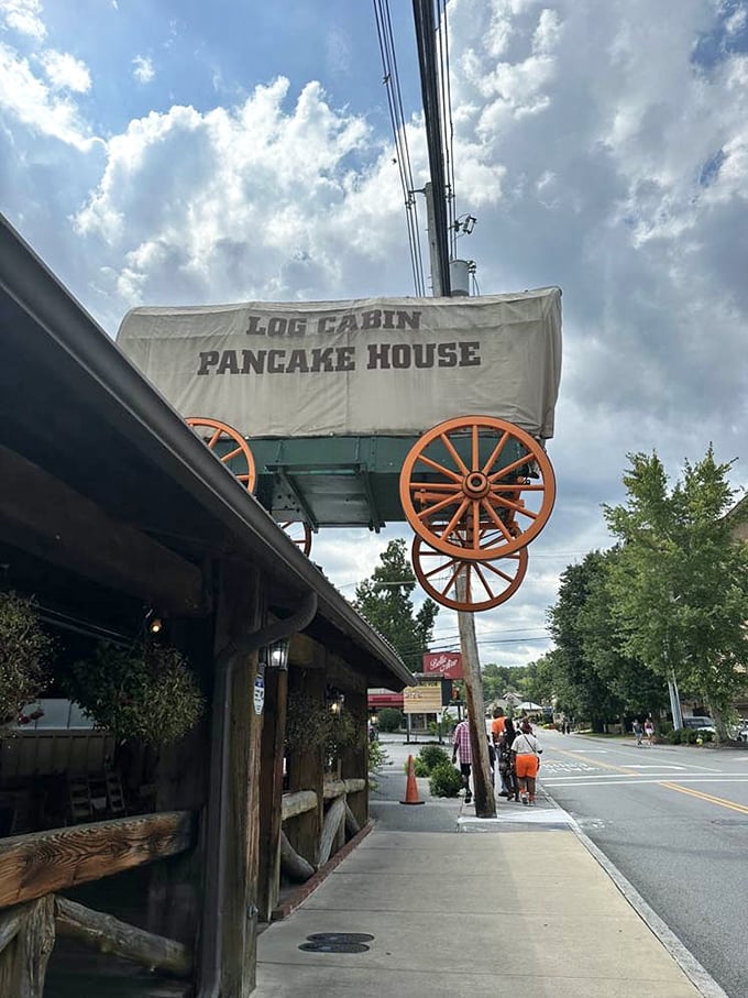 That covered wagon sign isn't just cute—it's a beacon of hope for hungry travelers, promising pioneer-sized portions that would make Daniel Boone proud.