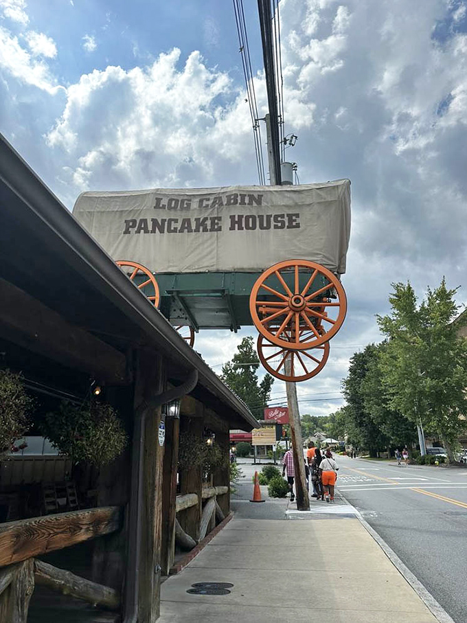 That covered wagon sign isn't just cute—it's a beacon of hope for hungry travelers, promising pioneer-sized portions that would make Daniel Boone proud.