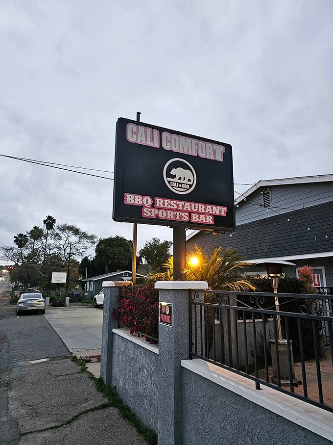 As dusk settles, the Cali Comfort sign becomes a beacon for the barbecue faithful. The California bear logo nods to local pride.