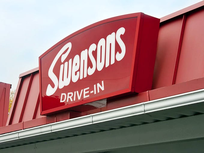 That signature red sign has guided hungry travelers for generations—like a North Star for those navigating the universe of comfort food.