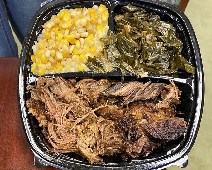 Brisket with collards and corn – a plate that tells the story of Southern cooking's genius for transforming humble ingredients into something magnificent.