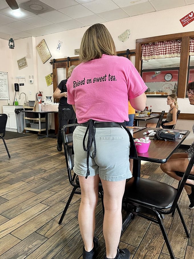 "Raised on sweet tea" isn't just a cute t-shirt slogan—it's a Southern philosophy of life. This server carries Southern hospitality on her back, literally.