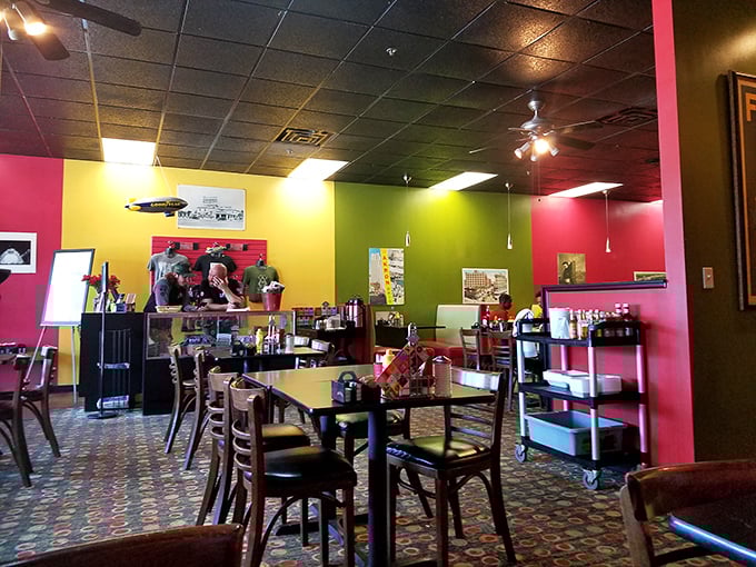 Where breakfast dreams come true—patrons savoring their morning favorites beneath signs that tell Akron's story.
