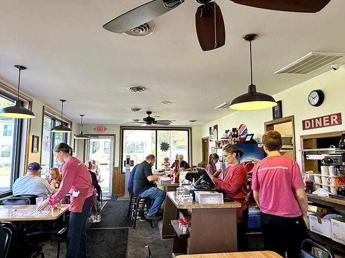 The heart of any great diner is its staff – moving with the choreographed precision of people who know exactly what your coffee cup needs.
