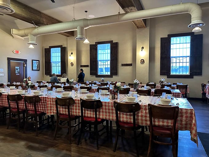The dining room awaits its guests like a theater before the show – tables set, water glasses filled, and culinary magic about to begin.