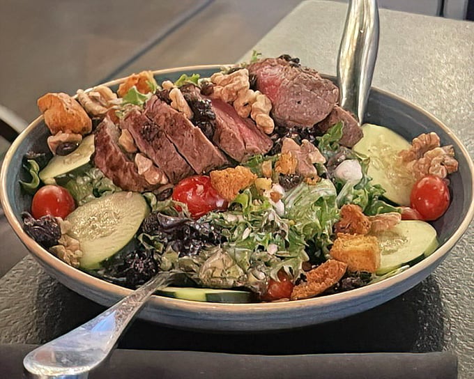 Steak salad that satisfies both your carnivorous cravings and health promises. Perfectly pink beef atop garden freshness—having it all.