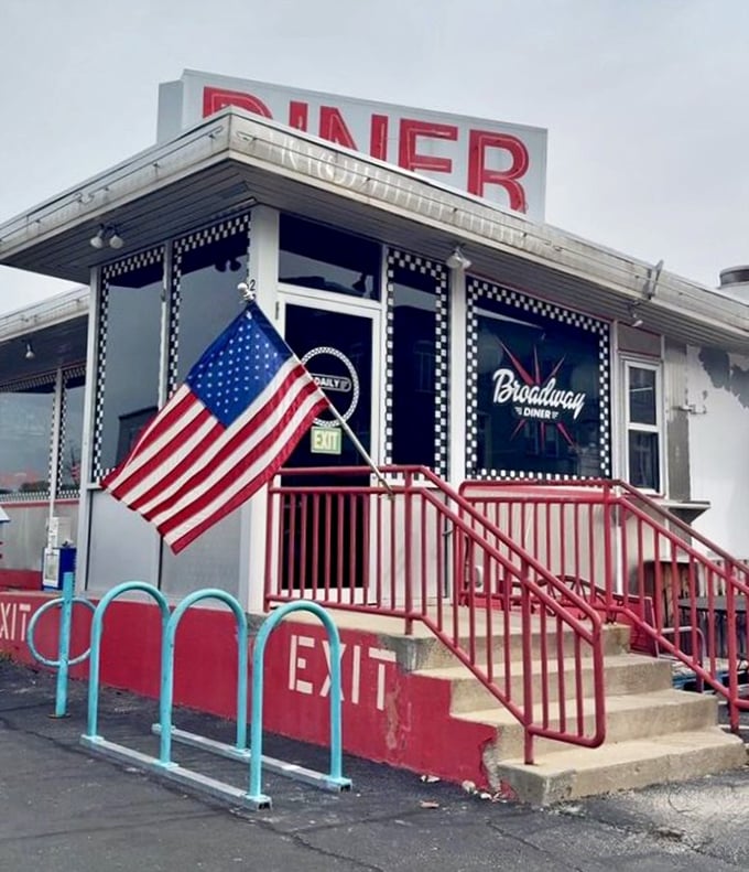 That classic diner profile against a bright blue Missouri sky – a beacon of breakfast hope in a complicated world.