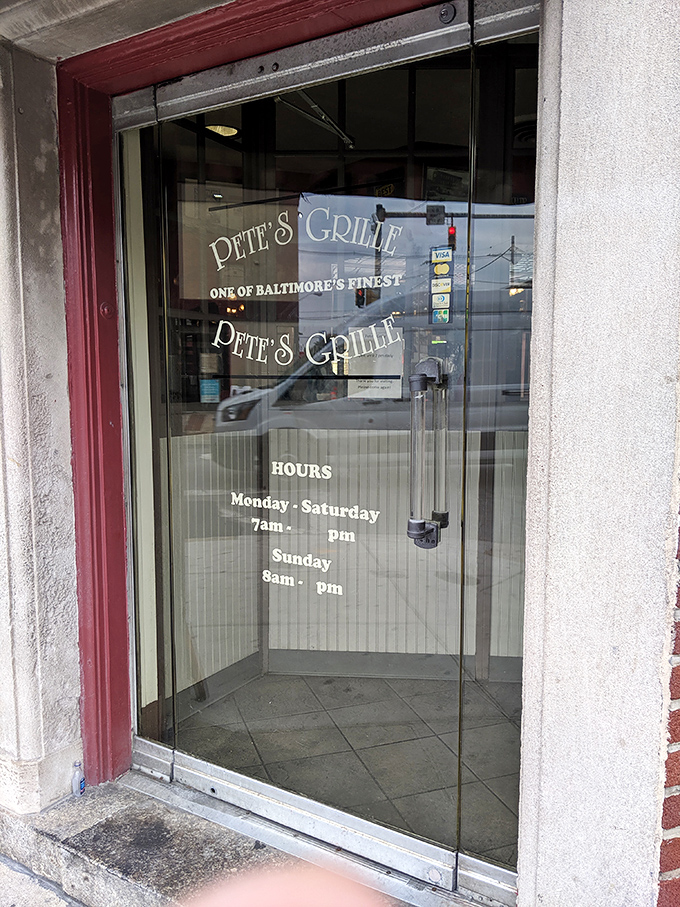 The glass door announces Pete's hours like a promise—seven days a week of breakfast possibility for a city that knows the value of starting the day right.