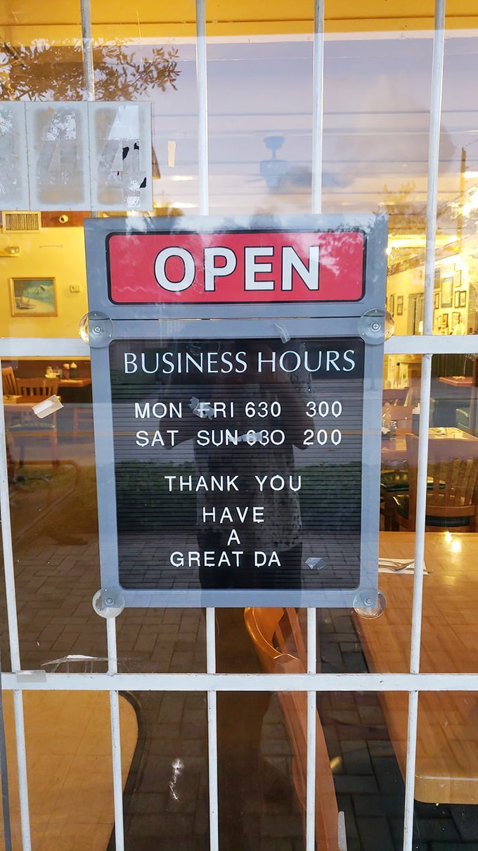 Business hours posted like a promise – early enough for sunrise seekers, open for weekend warriors.