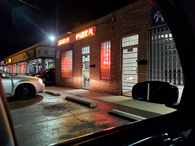 Night lights illuminate a neighborhood institution that's been feeding Columbus families for decades of devotion.