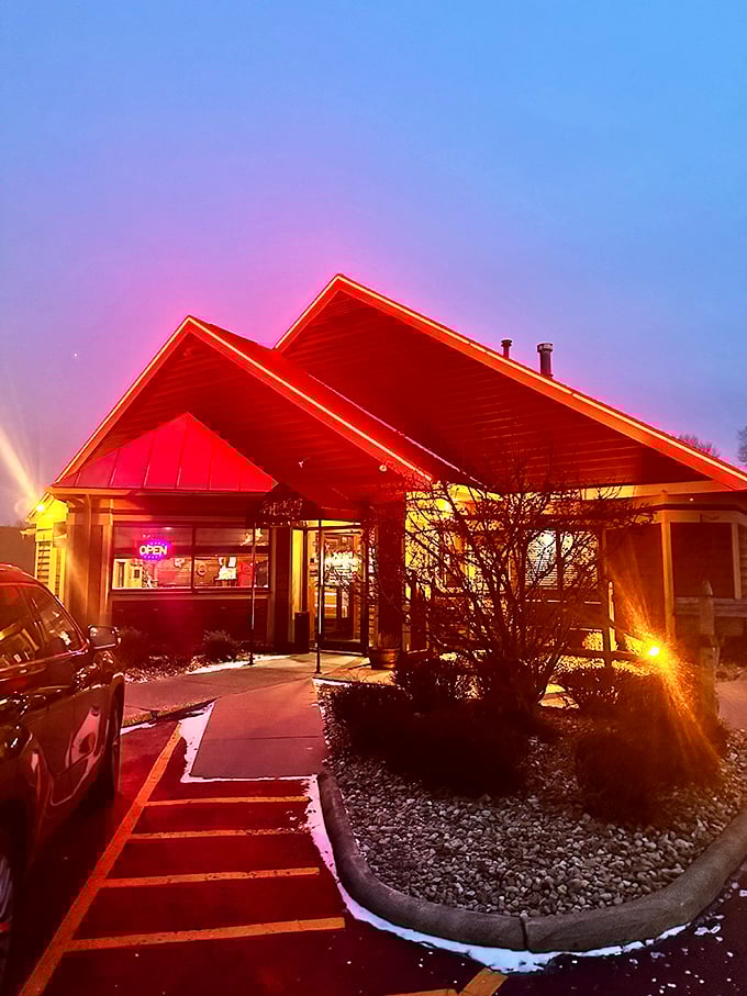 As dusk falls, the restaurant's red-tinged glow calls to hungry travelers like a carnivorous North Star guiding meat lovers home.