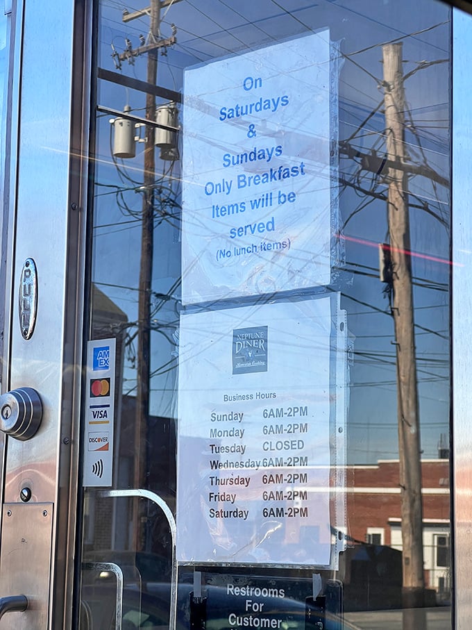 The hours posted clearly—because knowing exactly when you can get your hands on those pancakes is essential life information.