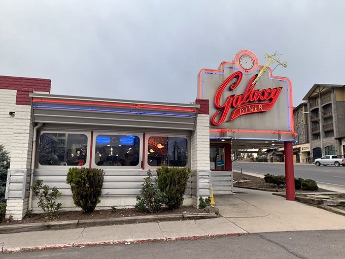 Even on cloudy days, Galaxy Diner's sign promises sunshine inside. Note the mountains in the background – pure Arizona majesty.