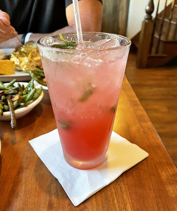 This strawberry mojito isn't just refreshing – it's what summer would look like if it took liquid form and decided to join you for dinner.
