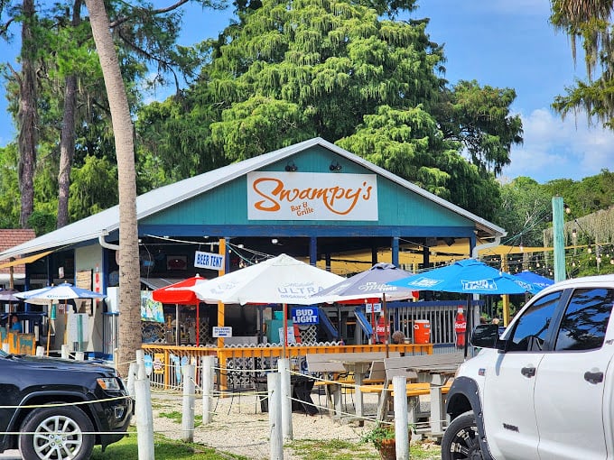 Swampy's Bar & Grille offers waterfront dining where the view rivals the menu and "fresh catch" isn't just marketing—it's geography.