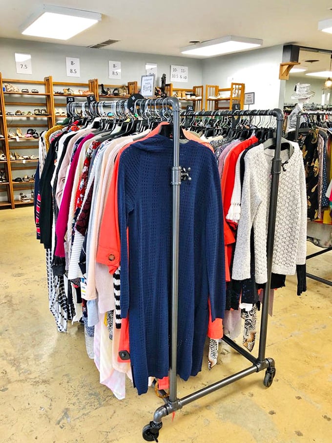 Sweaters organized by color create a cozy rainbow that makes choosing your next favorite effortless.
