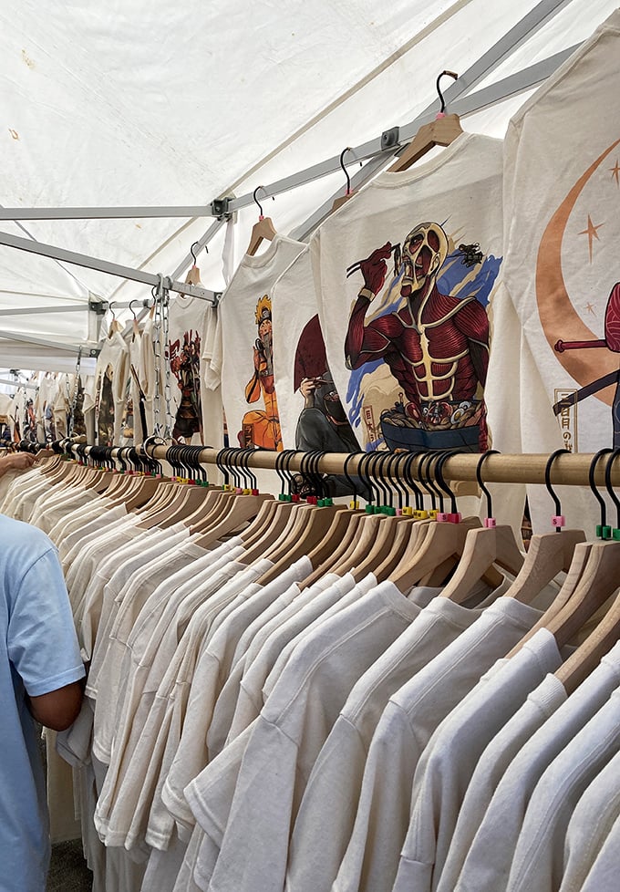 Wearable art hanging in perfect formation—these aren't just t-shirts, they're identity statements waiting to be adopted by the right torso.