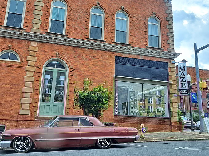 The Maze antique store with its vintage car parked outside – a perfect pairing that screams "interesting finds await inside!"