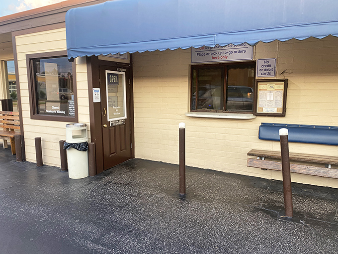 The humble to-go window where locals skip the wait but never the flavor – St. Augustine's version of a seafood speakeasy.