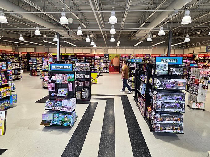 Toy store aisles designed by people who understand the gravitational pull between children and colorful plastic. Those "Best Sellers" signs are retail Jedi mind tricks.