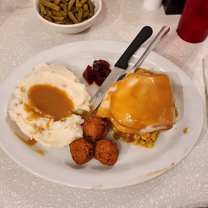 Turkey dinner that looks like Thanksgiving decided to show up on a random Tuesday – gravy and all.