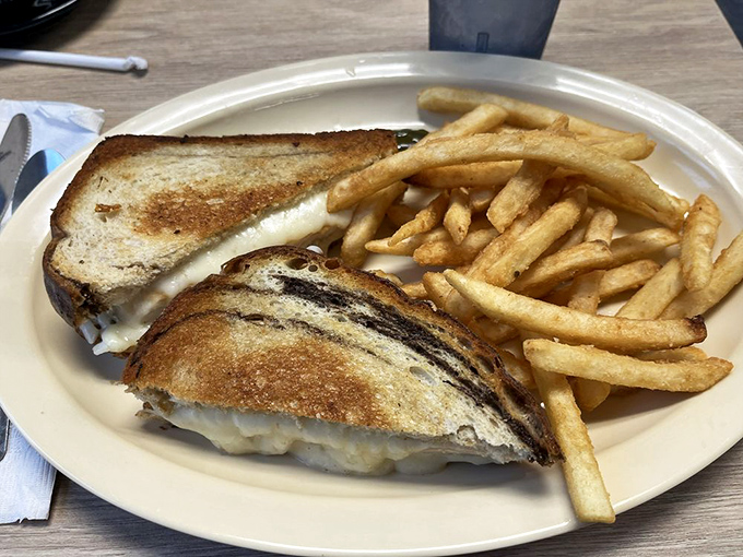 This grilled sandwich with its melty interior and golden exterior proves that lunch at a breakfast joint is never a compromise—it's a power move.