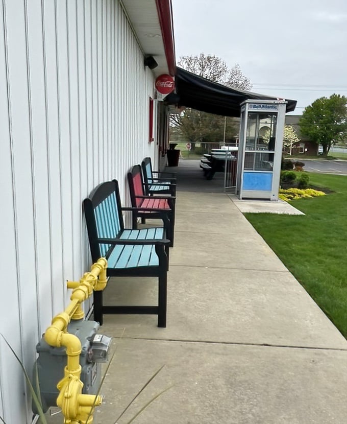 Even the waiting area outside has character, with turquoise benches and an honest-to-goodness phone booth that younger visitors might mistake for a time machine.