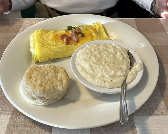That first cup of diner coffee—the liquid courage needed before deciding between biscuits and gravy or pancakes. Why not both?