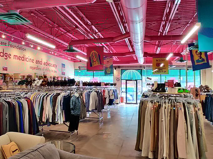 The spacious interior with its signature pink ceiling creates a shopping experience that feels more boutique than bargain basement.