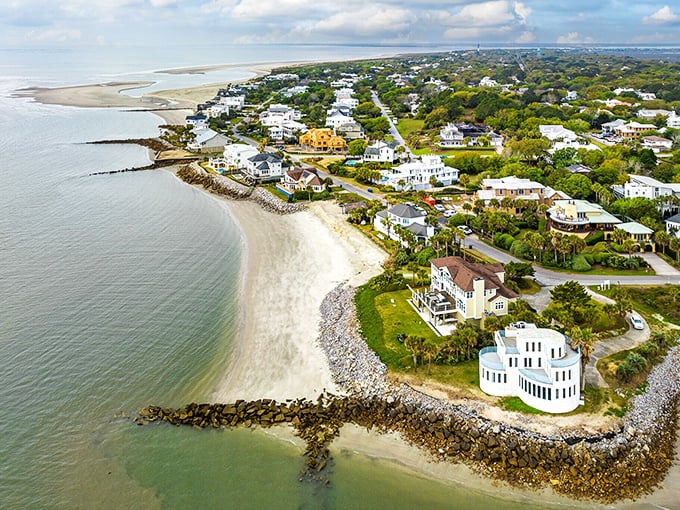 Another aerial perspective that reveals the island's perfect positioning – a slender paradise where marsh meets ocean in a geographic embrace.