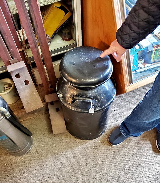 That's not just an old milk can—it's a portal to rural America's past, when daily deliveries arrived in these sturdy vessels.
