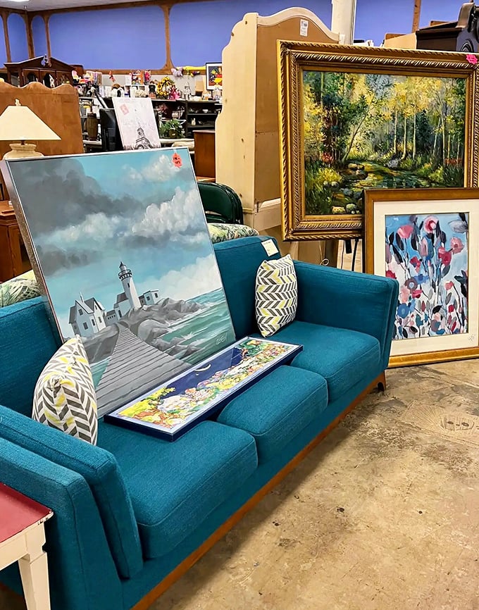 Art that tells stories – from serene lighthouses to vibrant abstracts, all displayed on a couch that's equally ready for its second act.