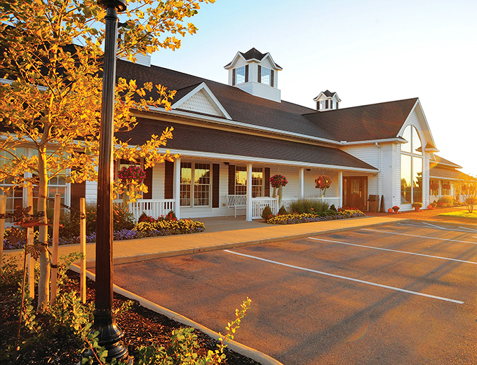 Bathed in golden hour light, the farmstead looks like it belongs on a postcard—or better yet, the cover of a cookbook.