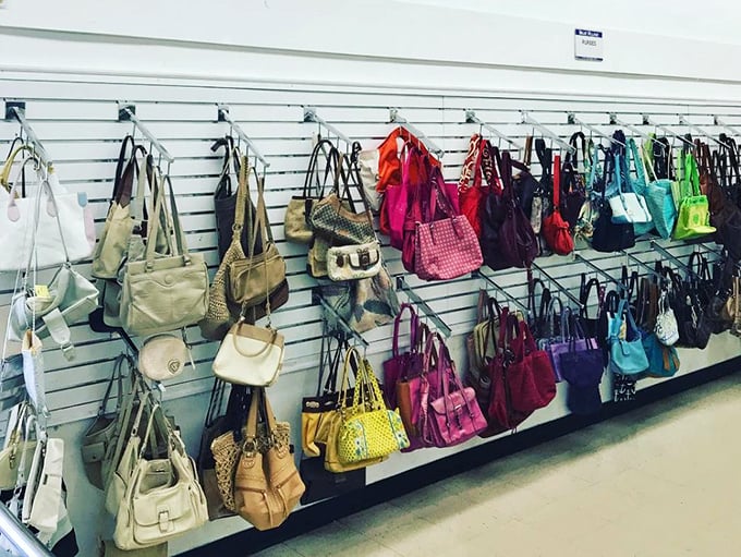 The handbag rainbow—from faux designer to genuine vintage, each purse holds secrets of shopping trips and nights out past.
