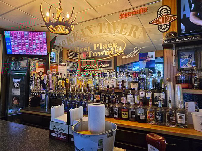 A proper Pennsylvania tavern bar doesn't need mixologists in suspenders—just cold beer, honest pours, and that deer antler chandelier that says "you're among friends now."