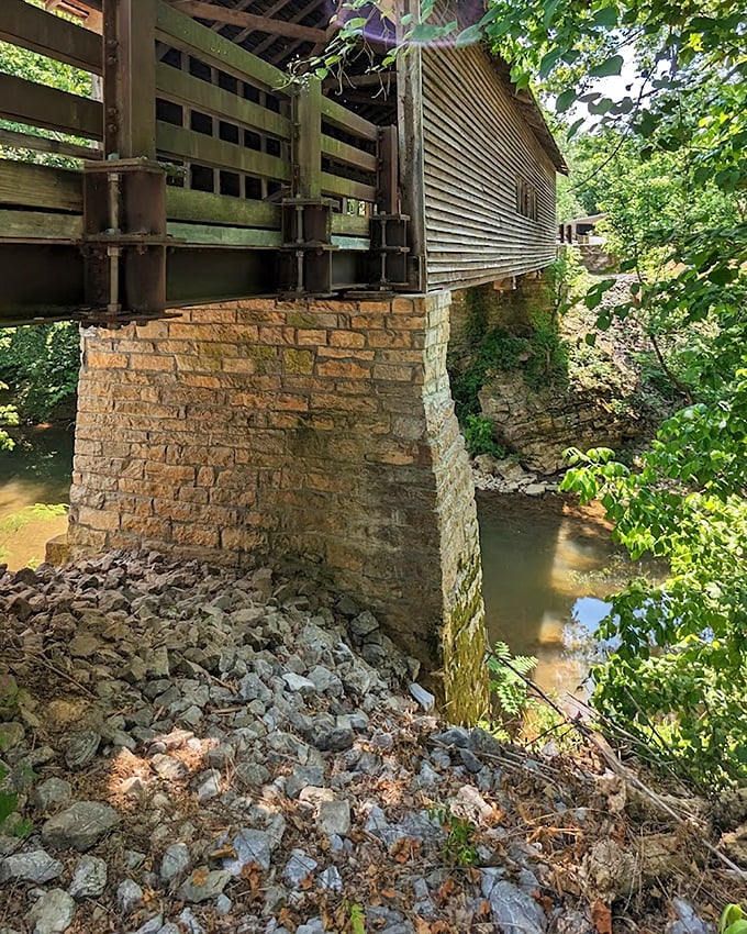 Engineering from an era before computer modeling. These stone pillars have shouldered their burden since Reconstruction, standing firm against flood and time. 